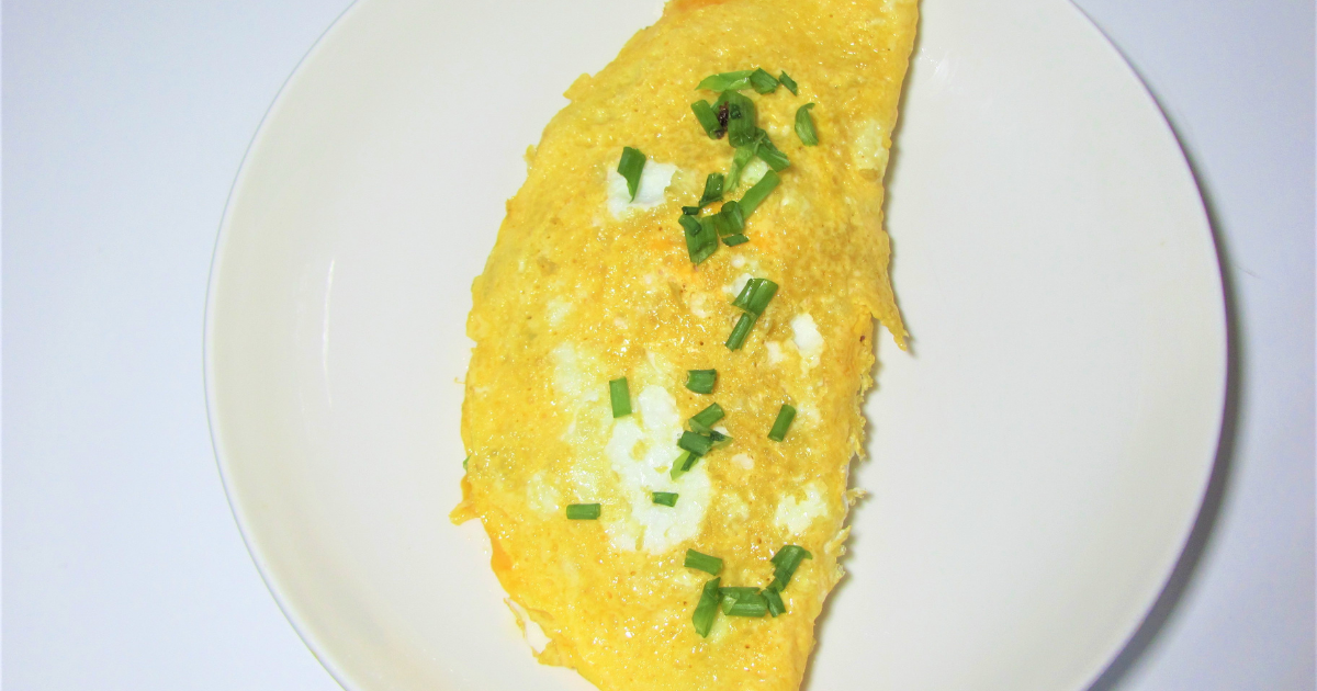 How To Make A Delicious Omelette With Vegetables And Cheese